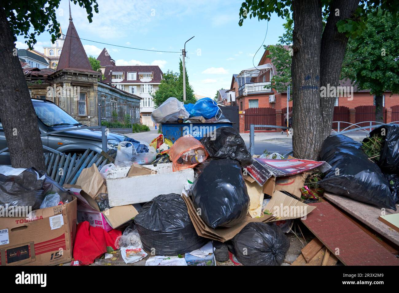 Pile of different garbage on the city street Stock Photo - Alamy