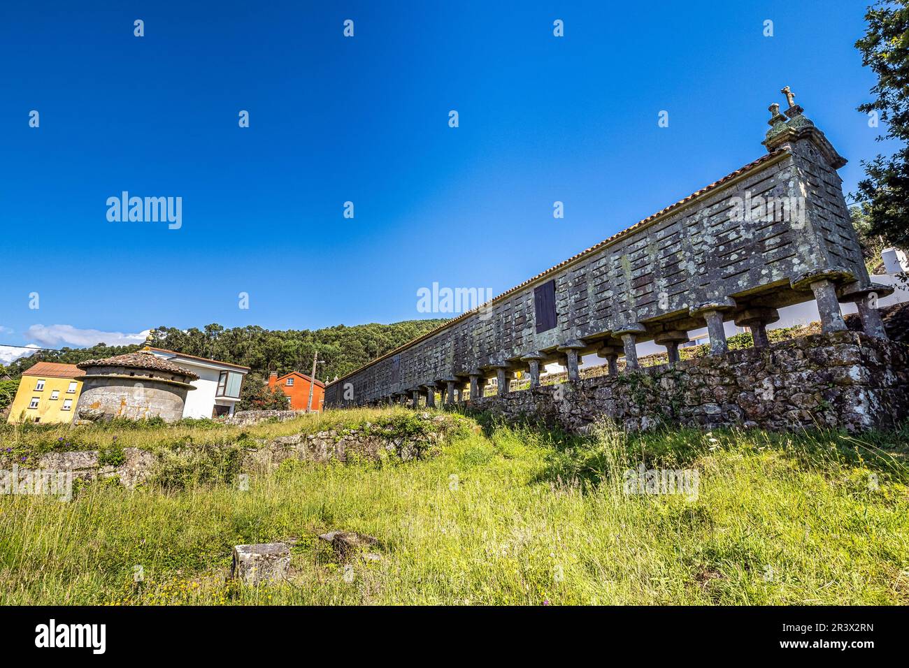 The long and narrow grain store, horreo at Lira in Galicia, Spain. This ...