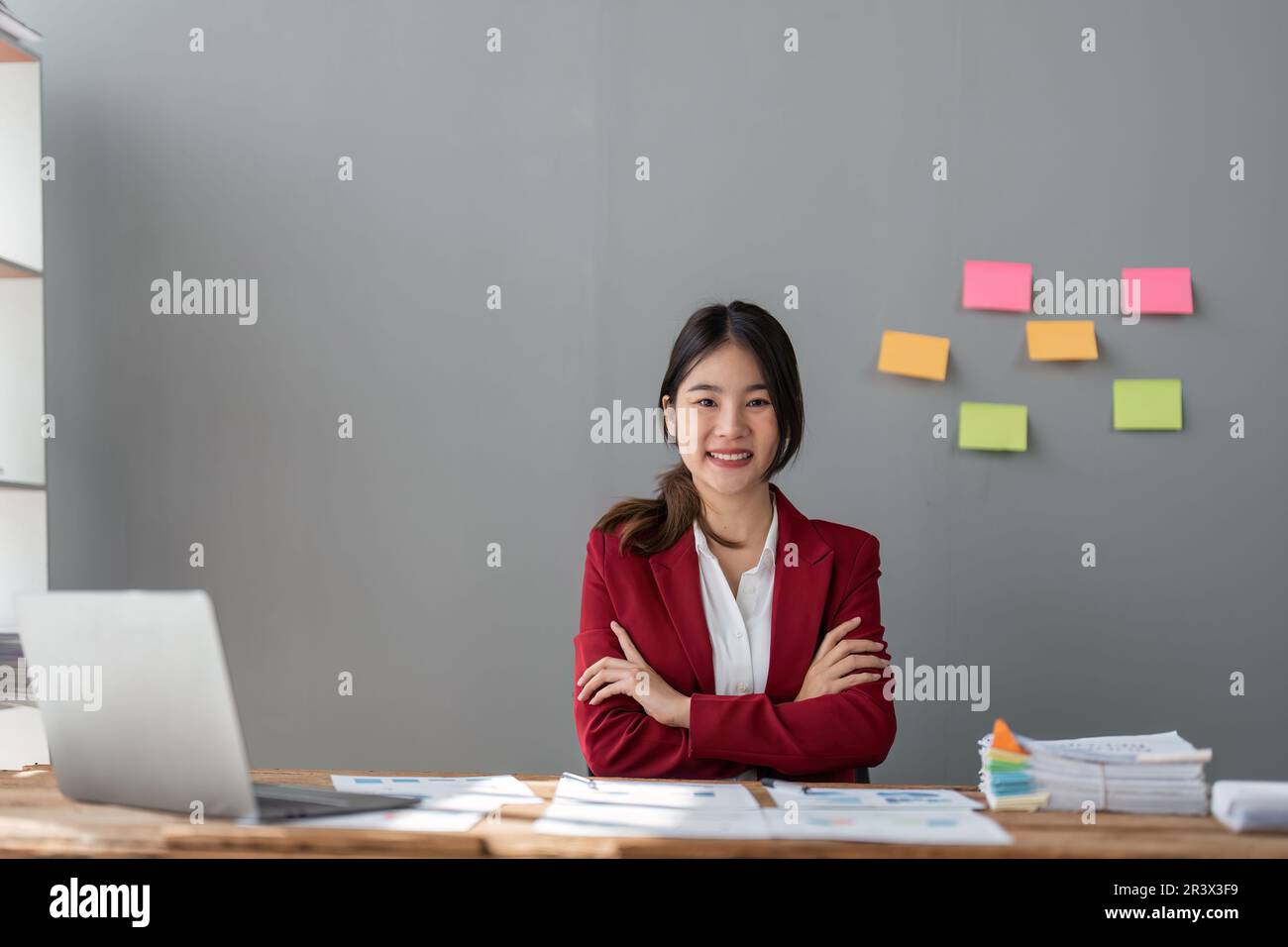 Happy business lady smiling to camera posing working sitting at ...