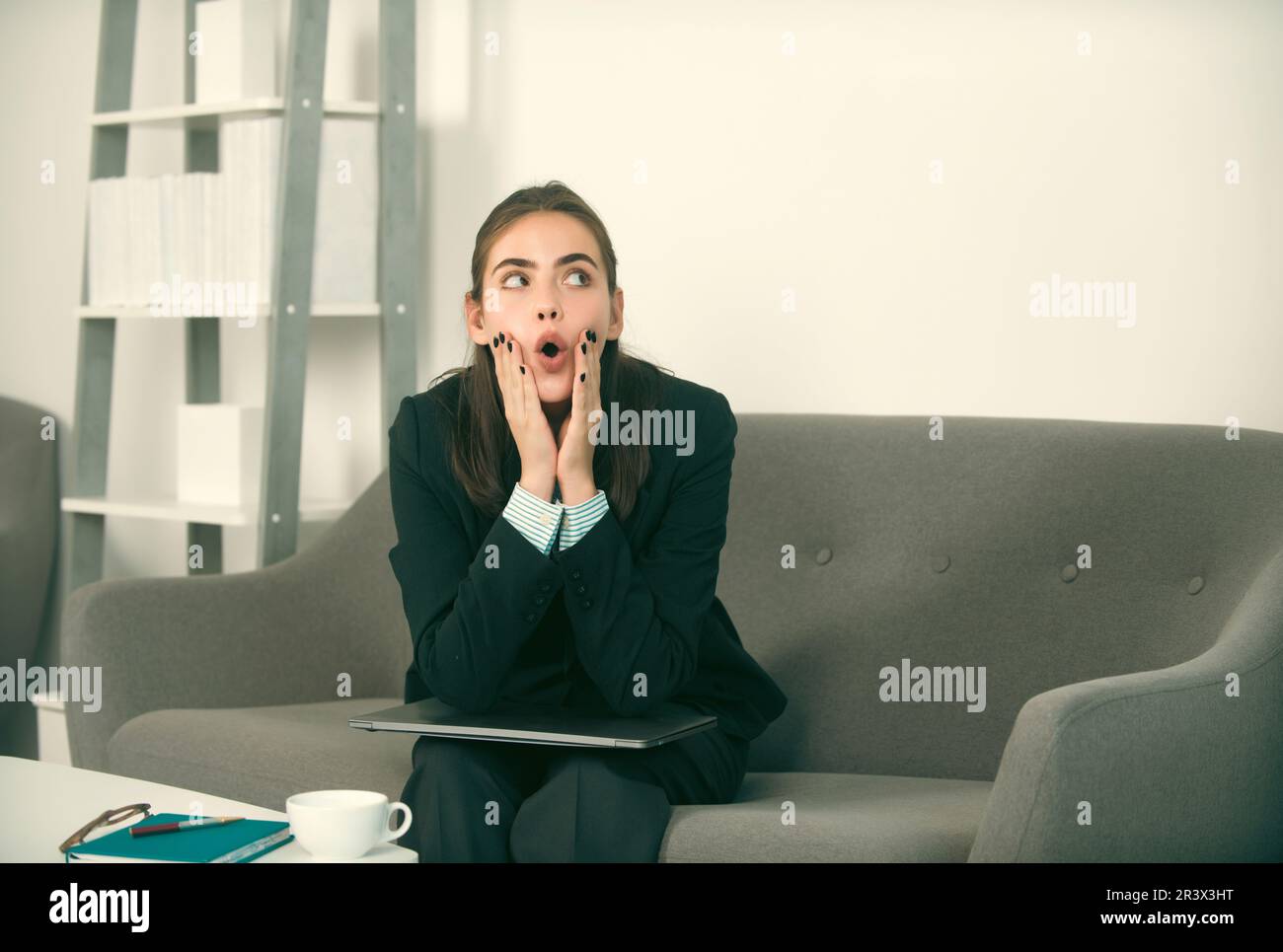Surprised funny business woman entrepreneur working in office ...