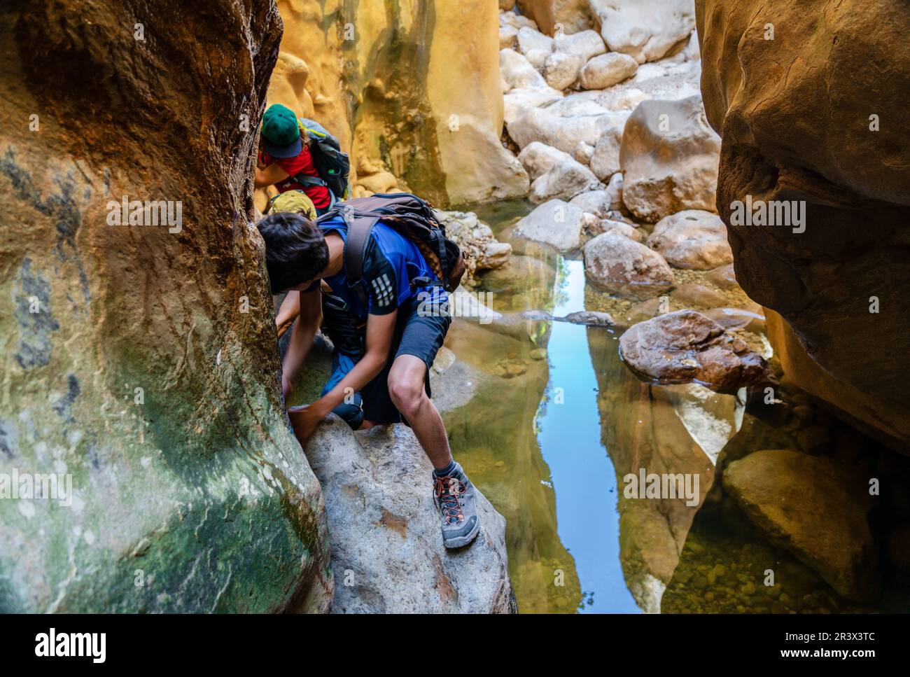Walkers dodging waterlogged stretches Stock Photo - Alamy