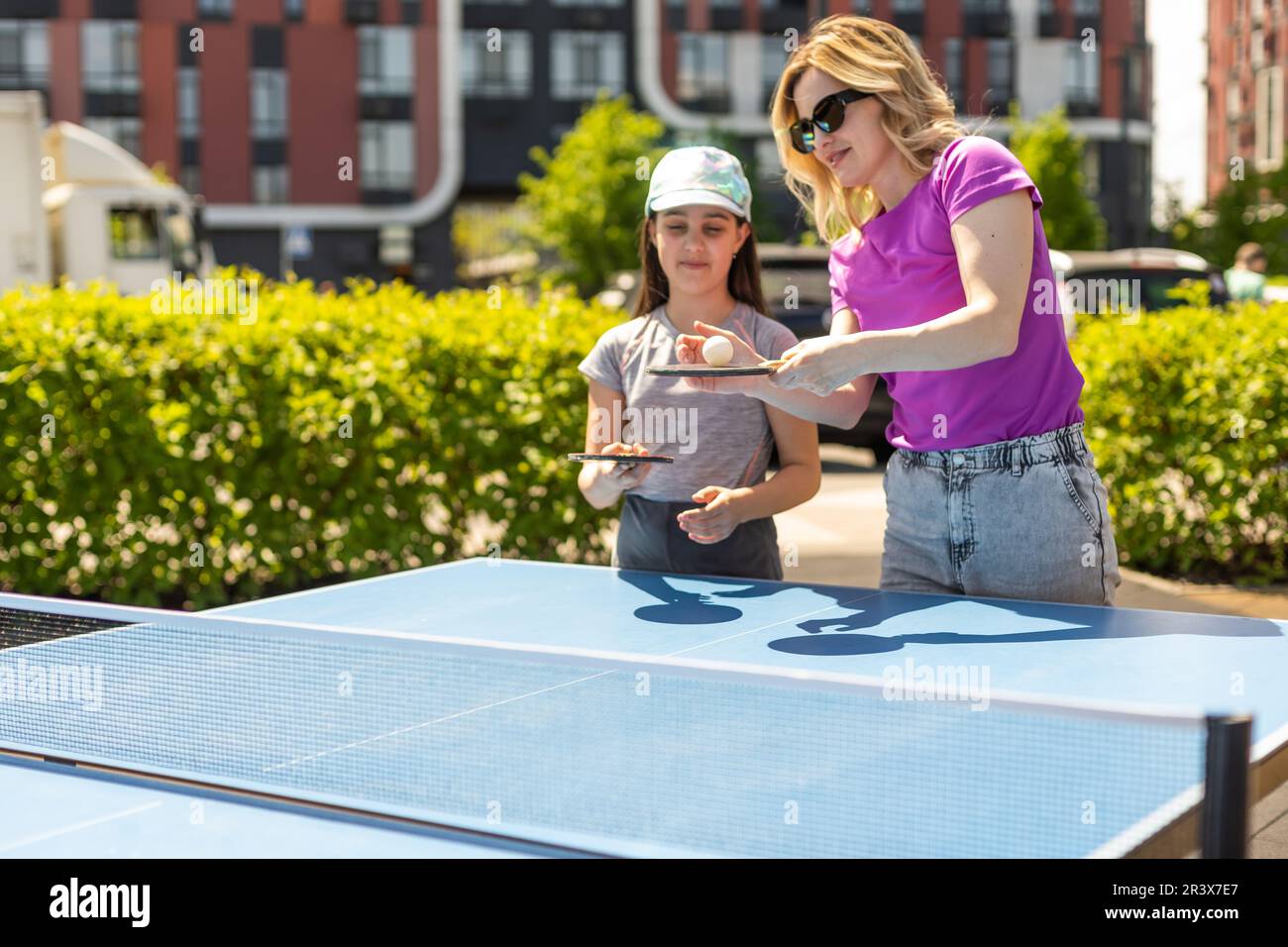 Family Playing Table Tennis