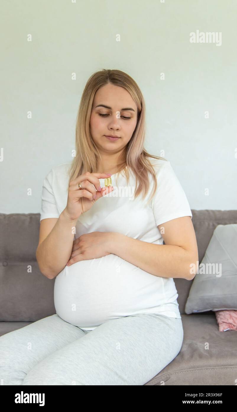 Pregnant woman drinks omega hi-res stock photography and images - Alamy