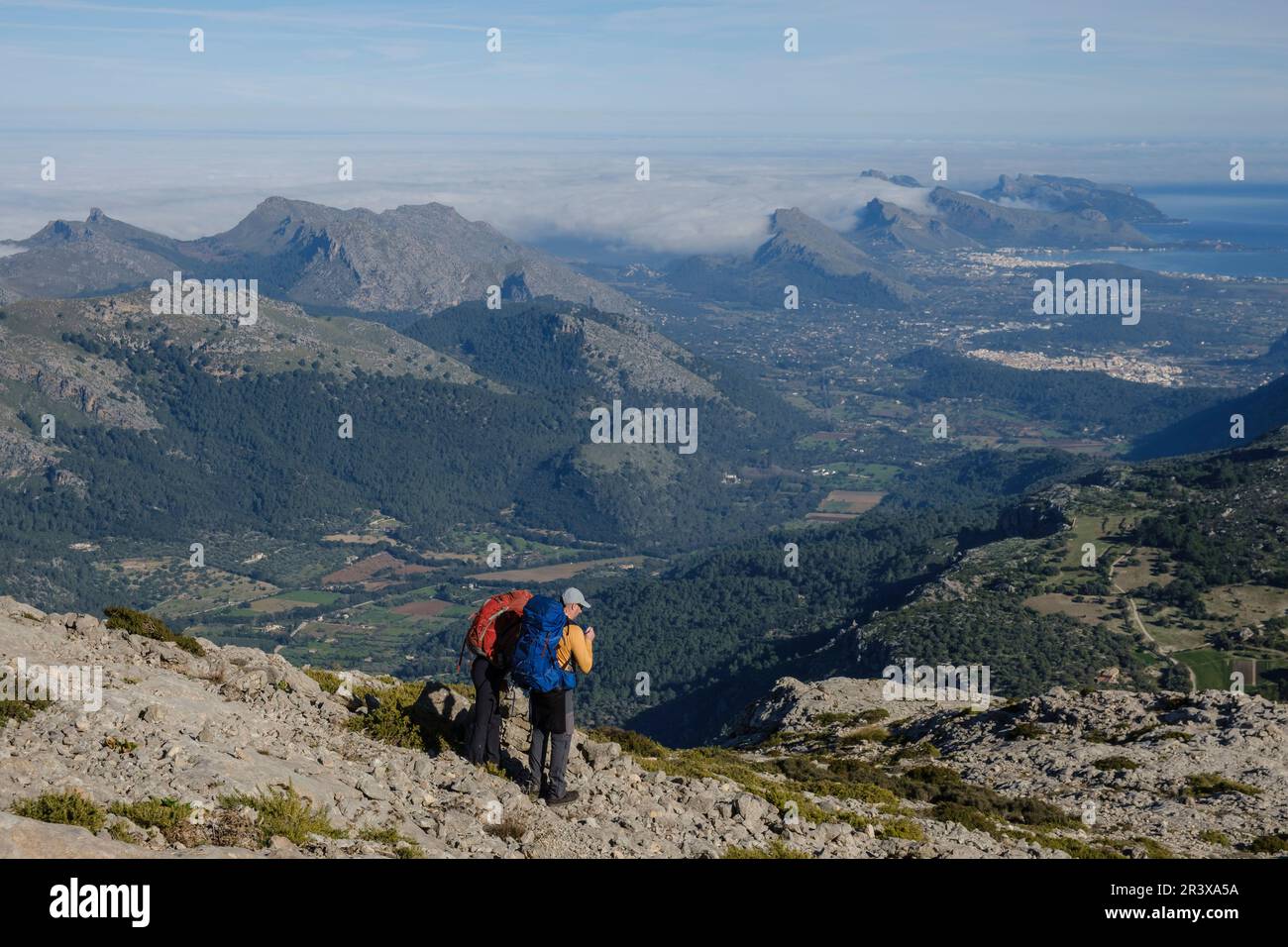 two hikers looking Alcudia and Pollensa bays from the Sierra de ...
