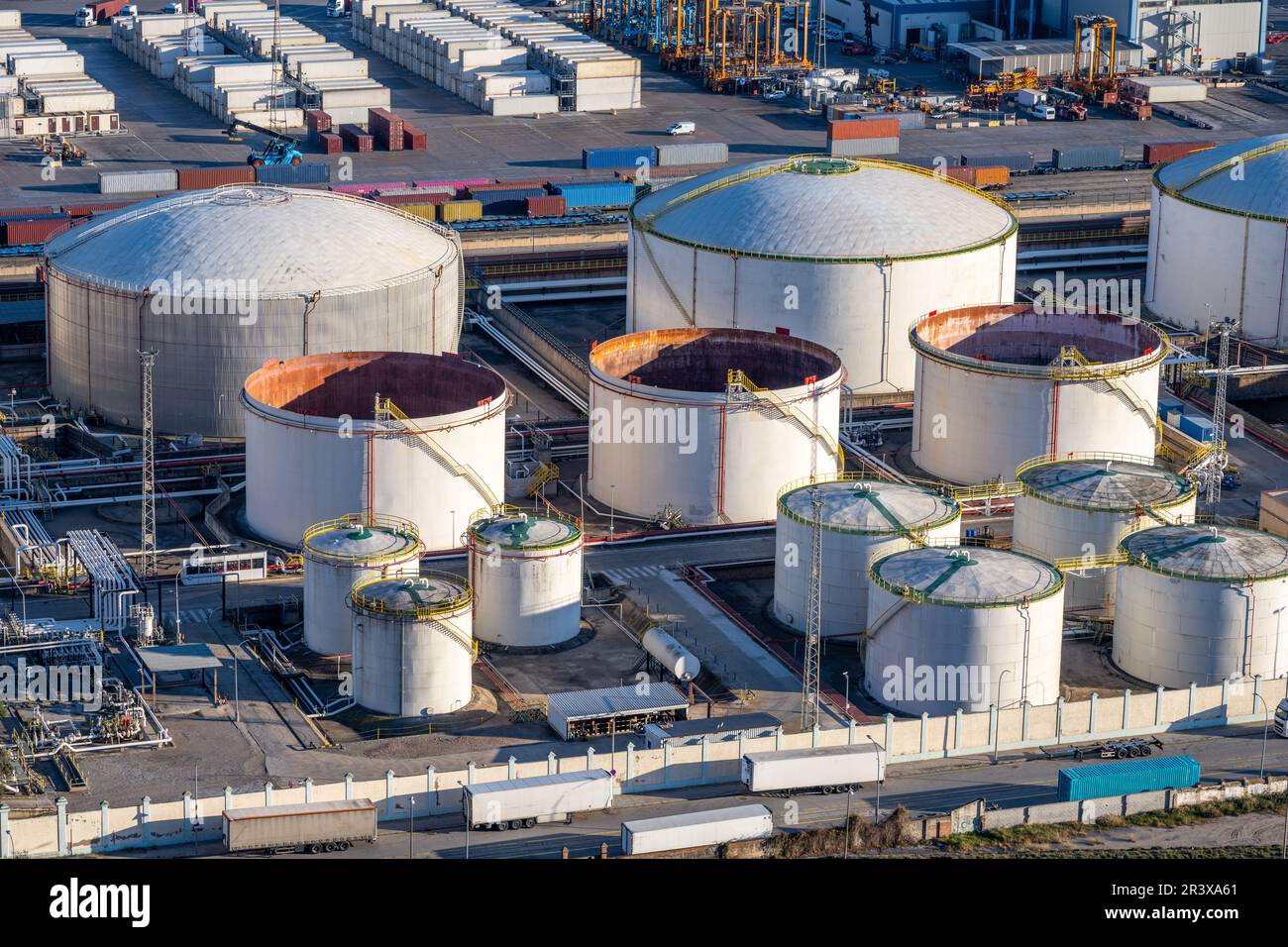 White storage tanks seen in the commercial port of Barcelona Stock ...