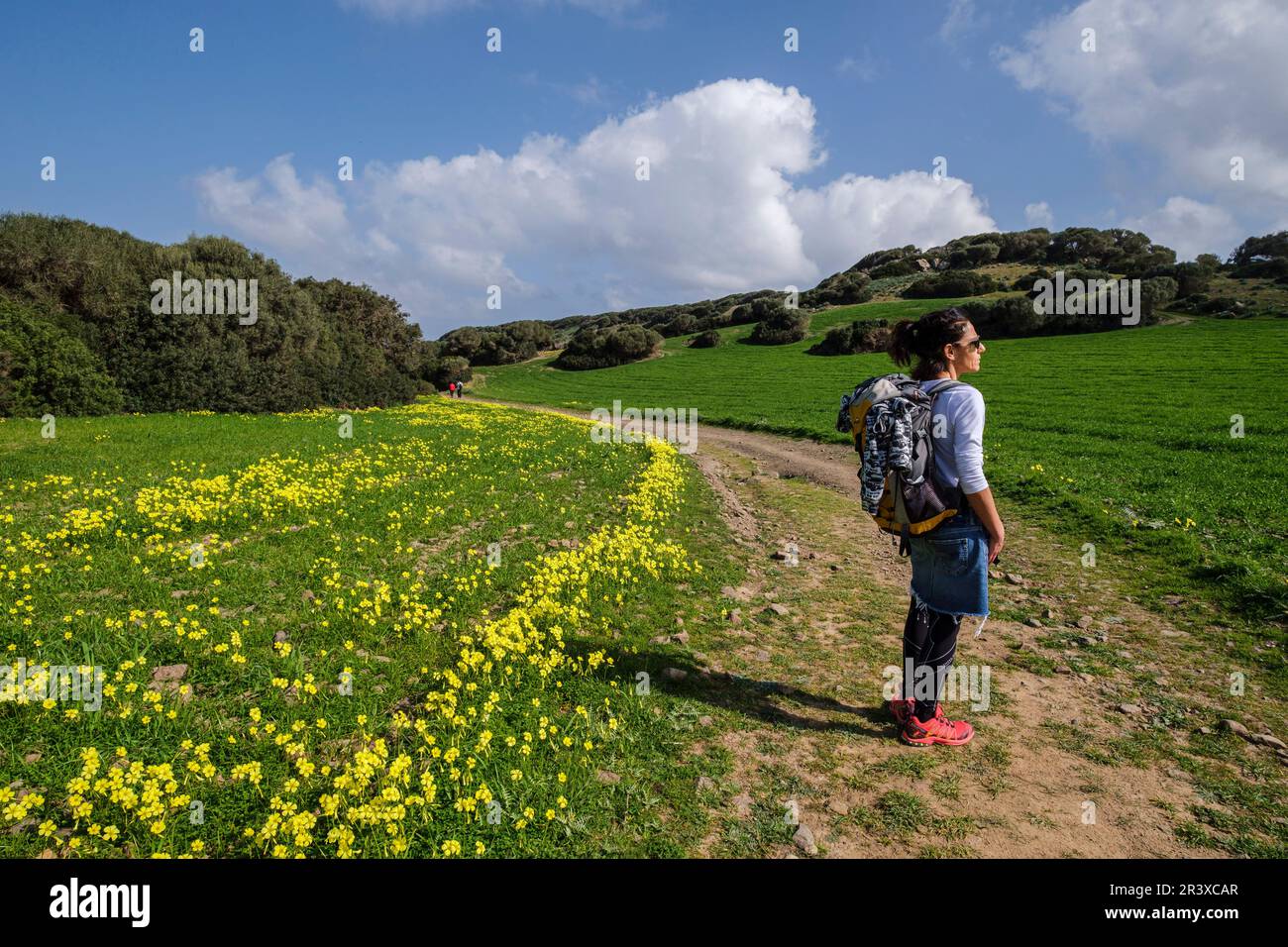 hiker walking the horse path, - Cami de Cavalls-,s'Albufera des Grau ...