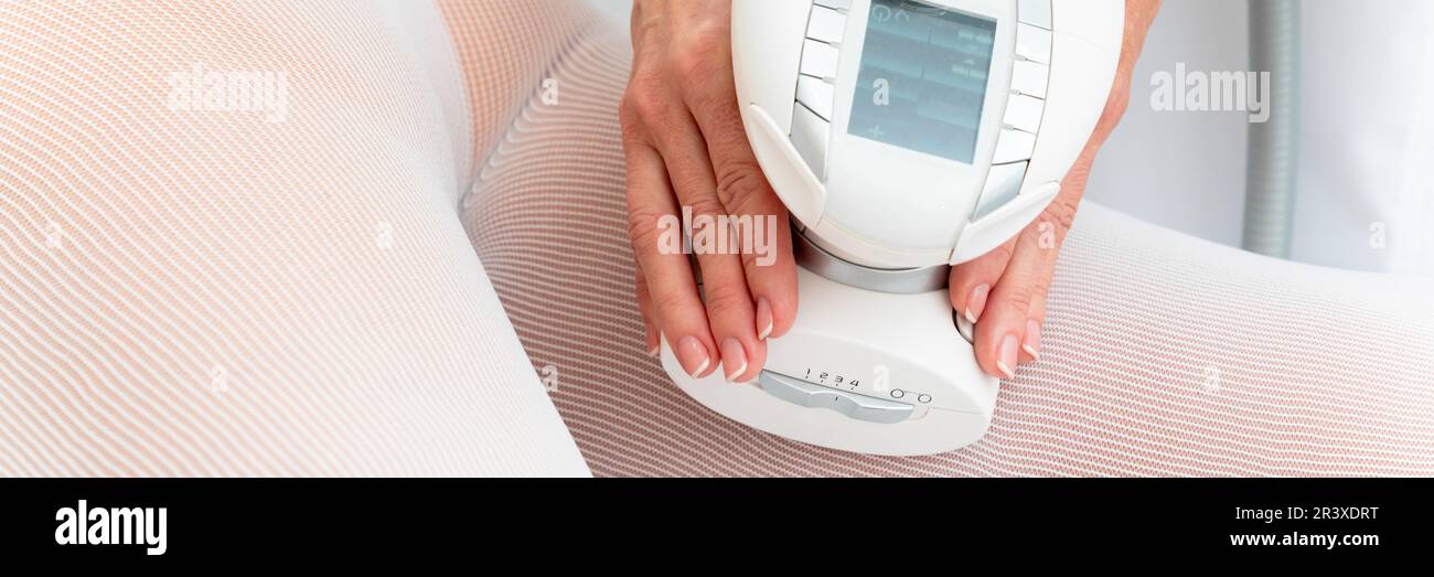 Woman In Special White Suit Getting Anti Cellulite Massage For Legs In
