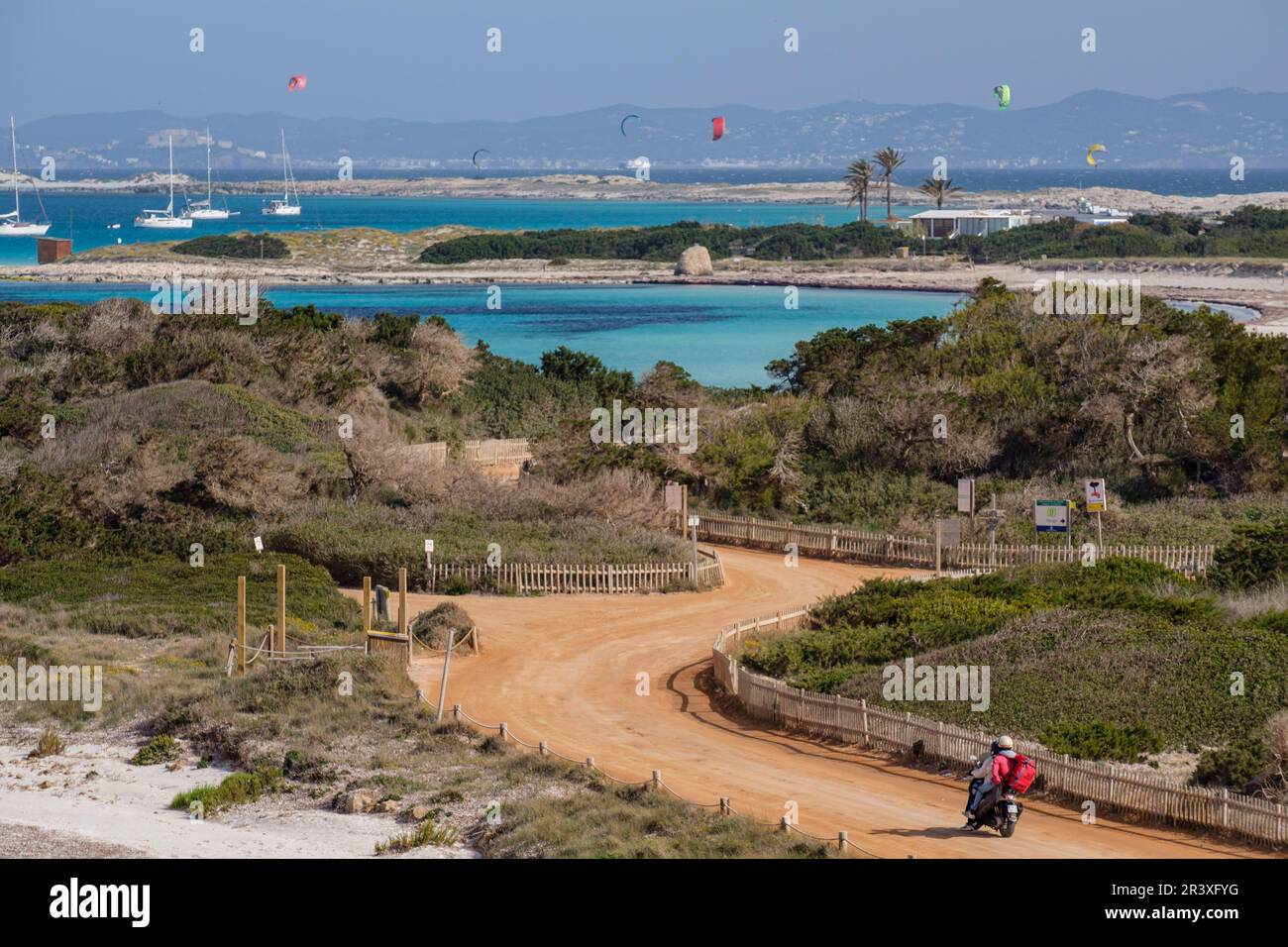 Tourist cycle on Illetes Path Stock Photo - Alamy
