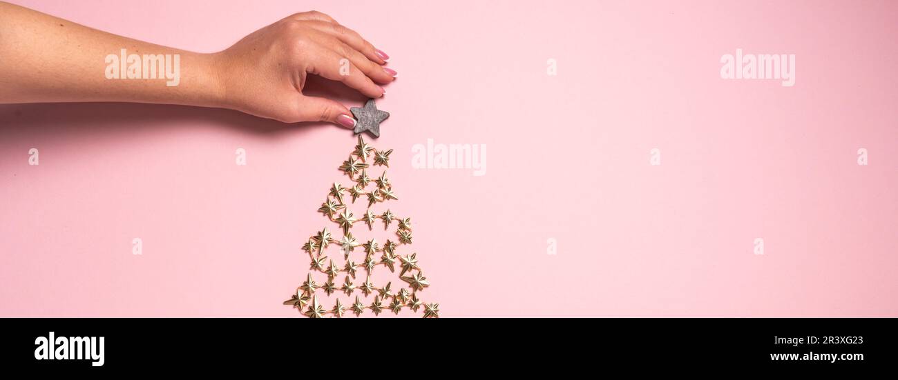 Woman hands decorating christmas tree hi-res stock photography and ...