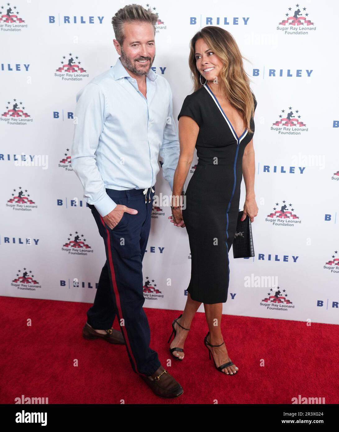 (L-R) Scott Rigsby and Brooke Burke at the 12th Annual Sugar Ray ...