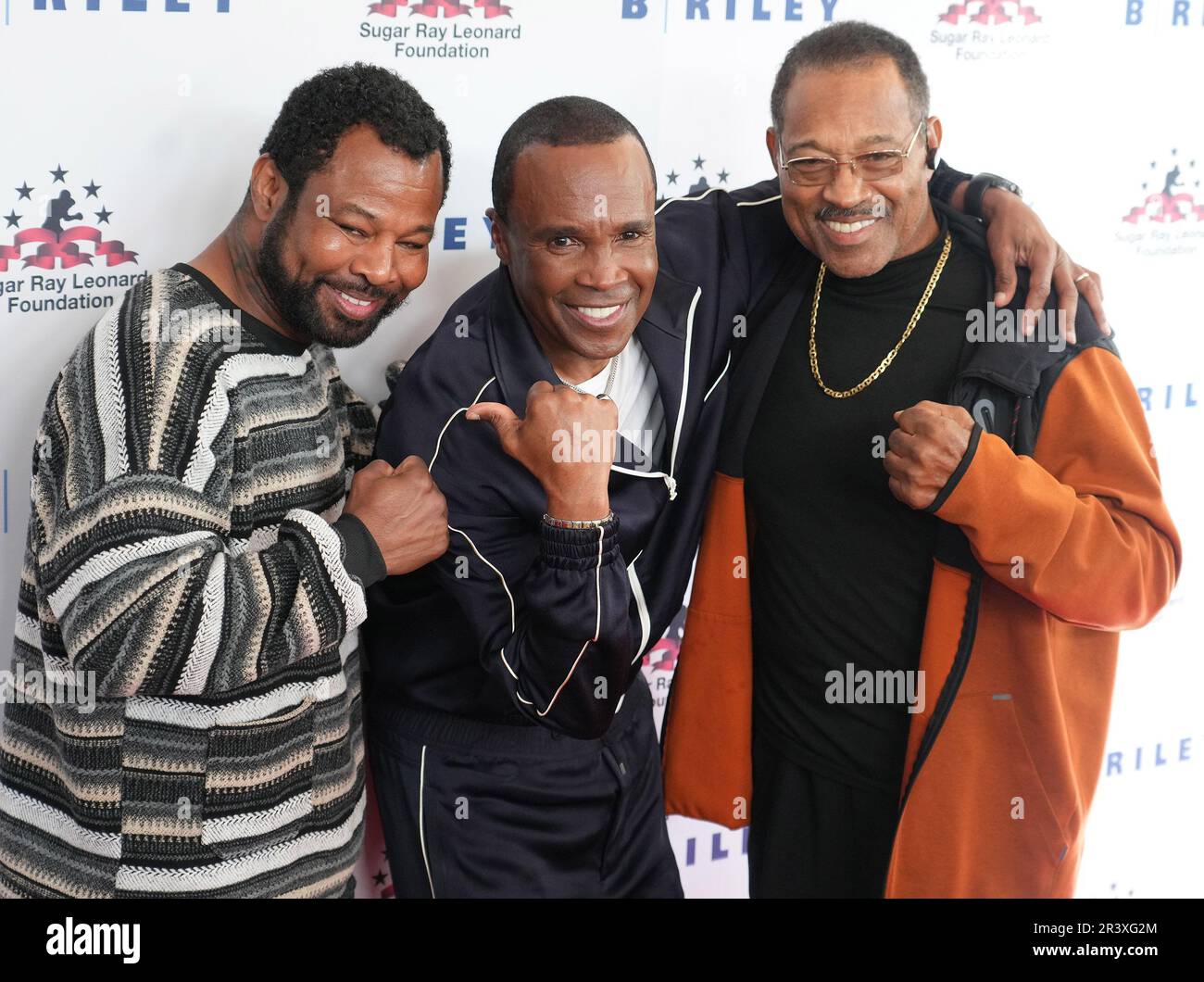 (L-R) Sugar Shane Mosley, Sugar Ray Leonard and Jack Mosley at the 12th ...