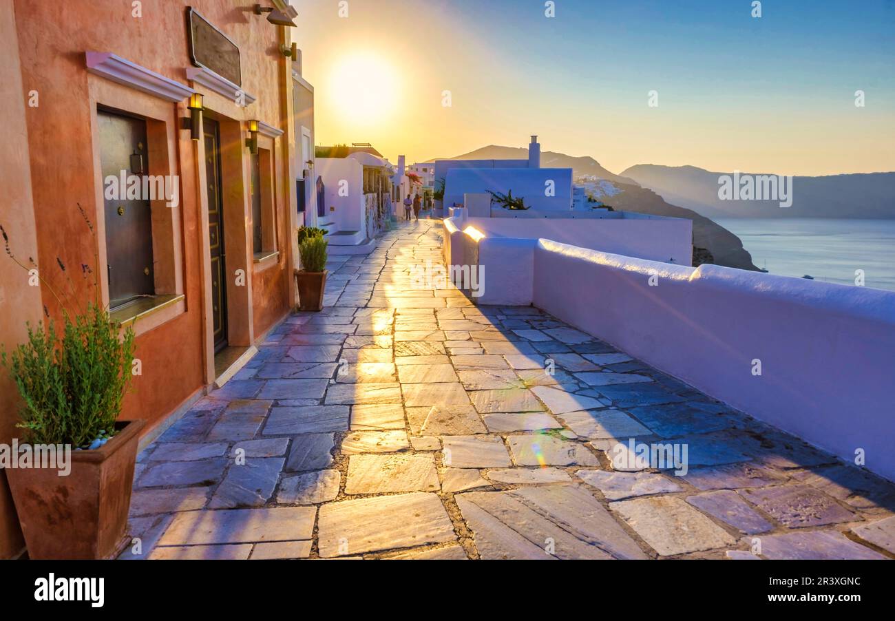 Sunrise by the ocean of Oia Santorini Greece, traditional Greek village Stock Photo - Alamy