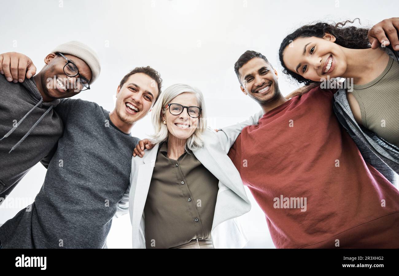 Hug, happy and teamwork with portrait of business people for support ...