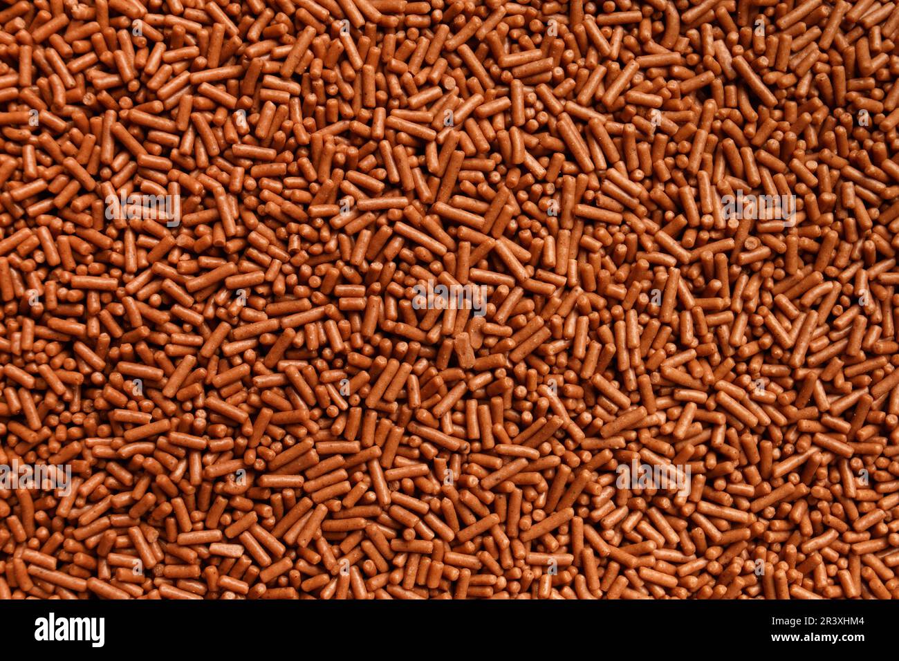 Chocolate chip background close-up, milk chocolate chip as abstract ...