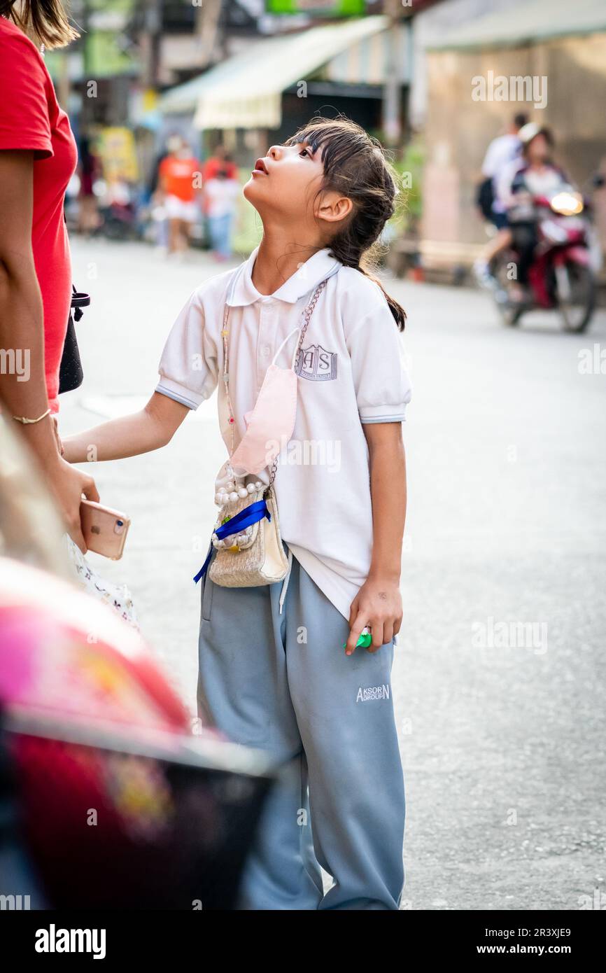 A Young Thai Girl Waits For A Ride Home After School In The Thailand 2816