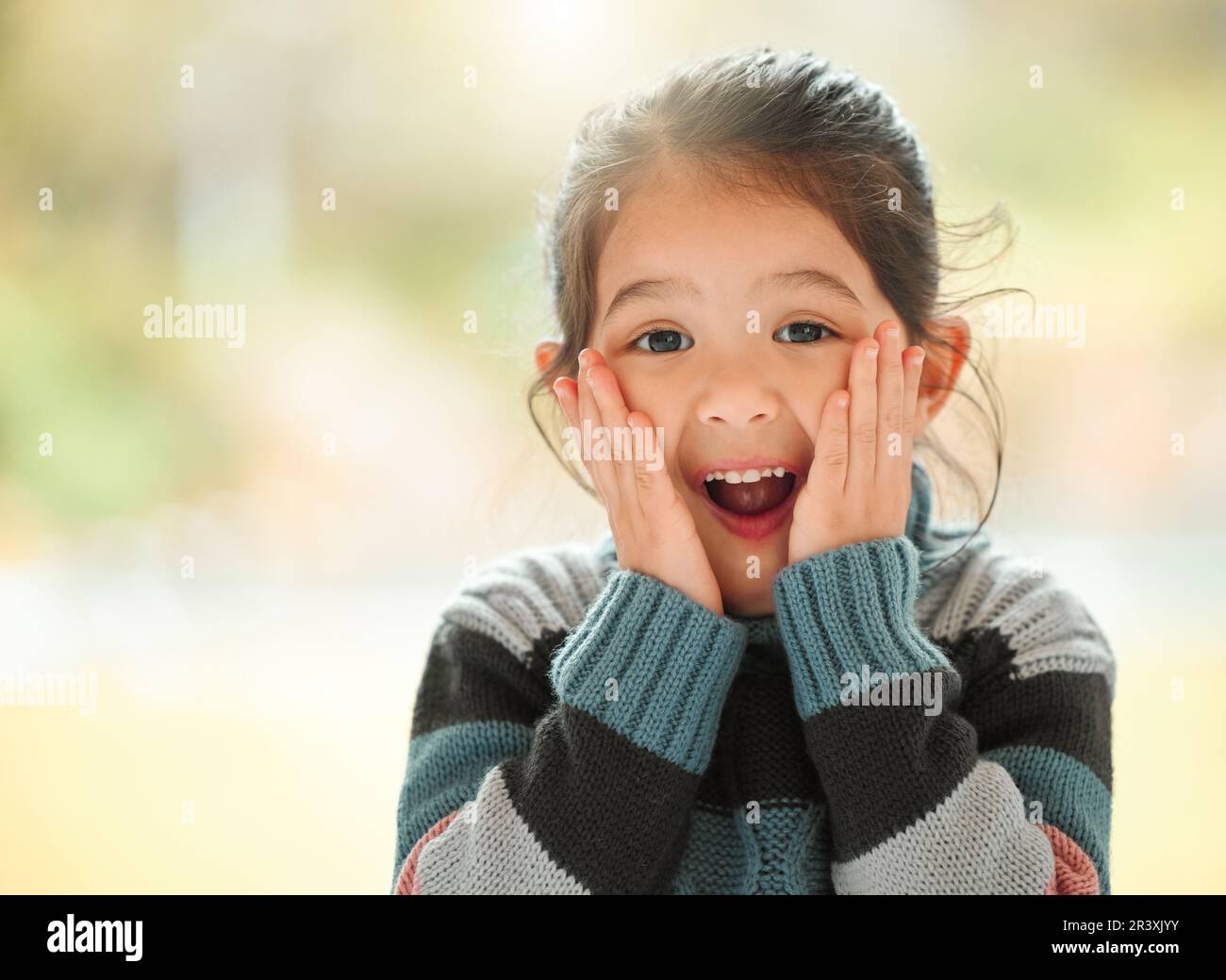 Shock, surprise and portrait of child in home for happy, wow and comedy. Happiness, comic and ...