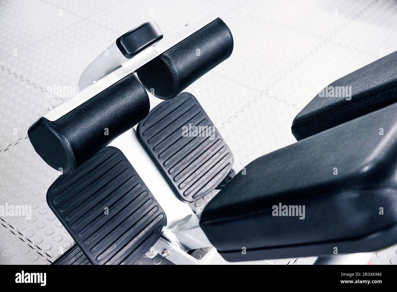Abdominal machine inside a gym, fitness concept Stock Photo - Alamy