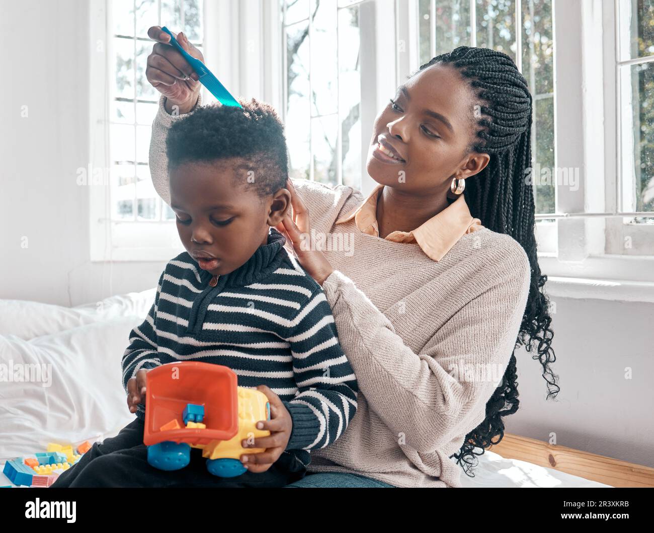 Black family, mother and comb hair of kid in home bedroom for grooming ...