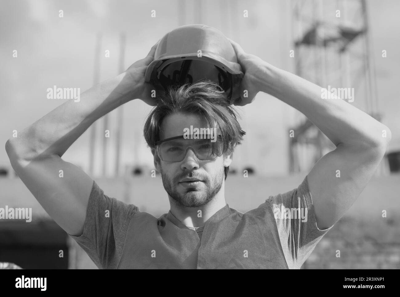 Portrait of worker man at construction site. Portrait of construction ...