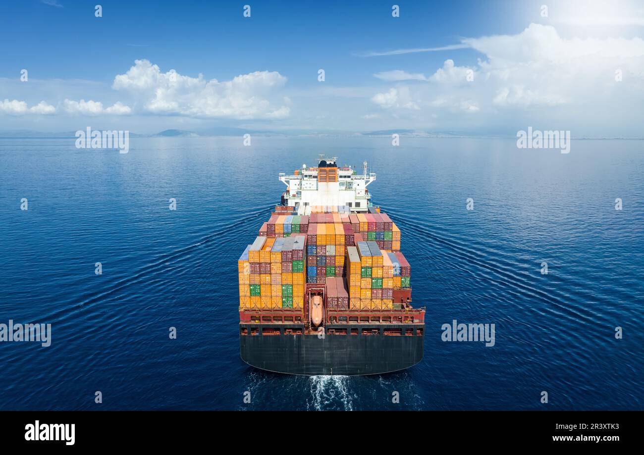 Aerial back view of a large container cargo carrier ship Stock Photo ...