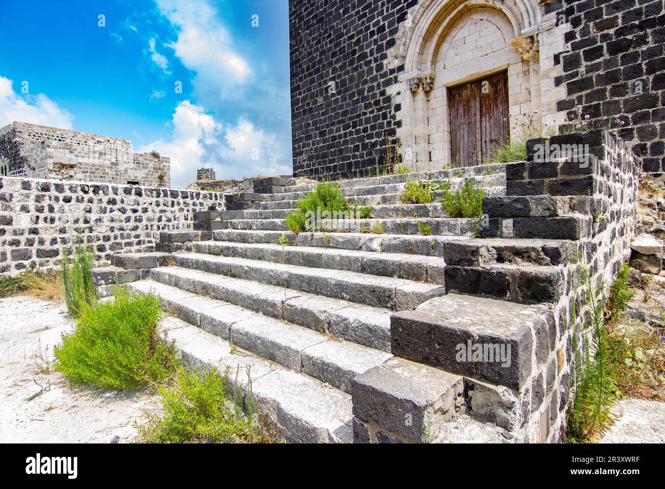 An external view of a big building inside Margat (Al-marqab) Castle in ...