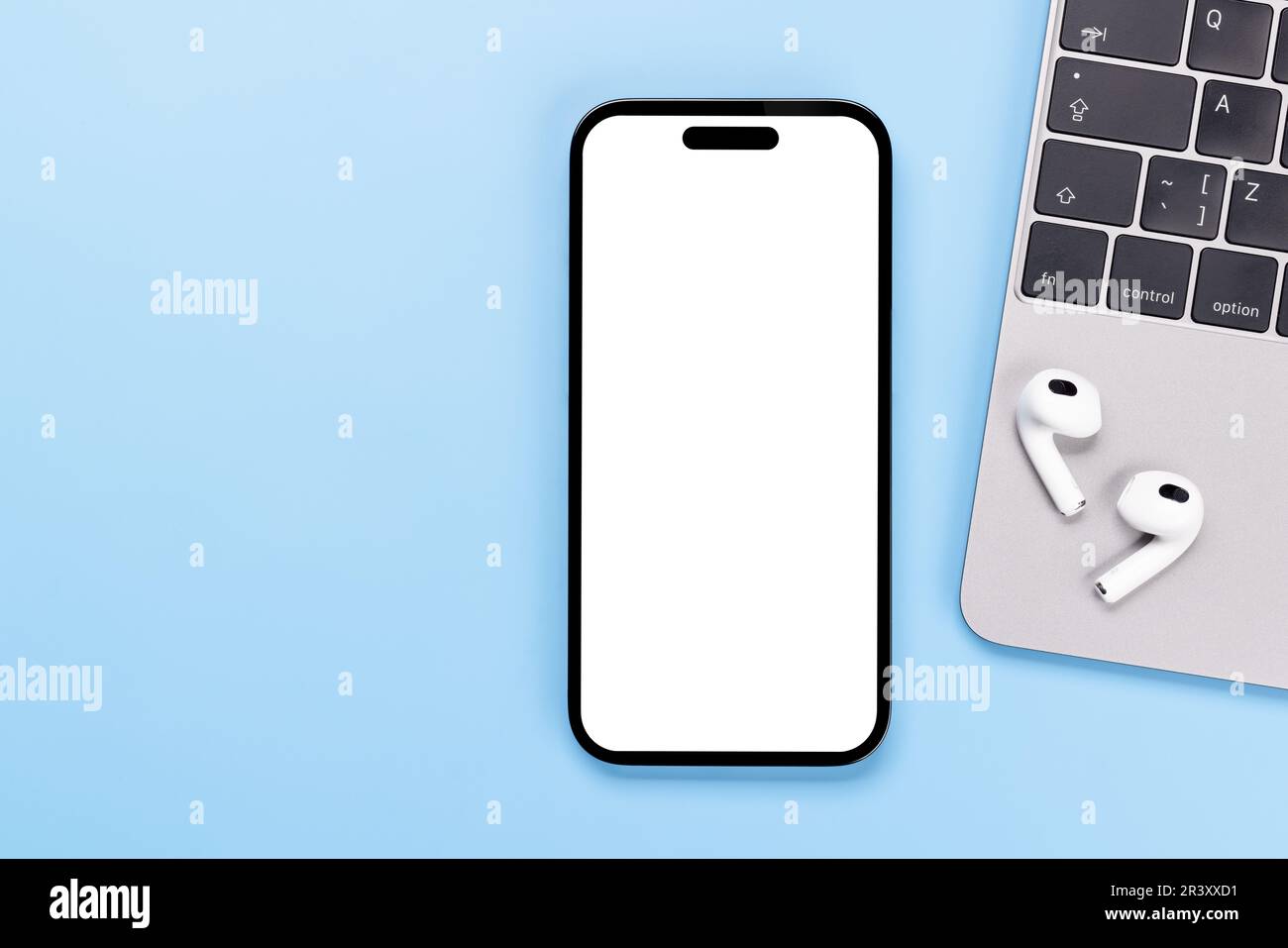 Blank white screen smartphone on a desk, perfect for your design mockup ...