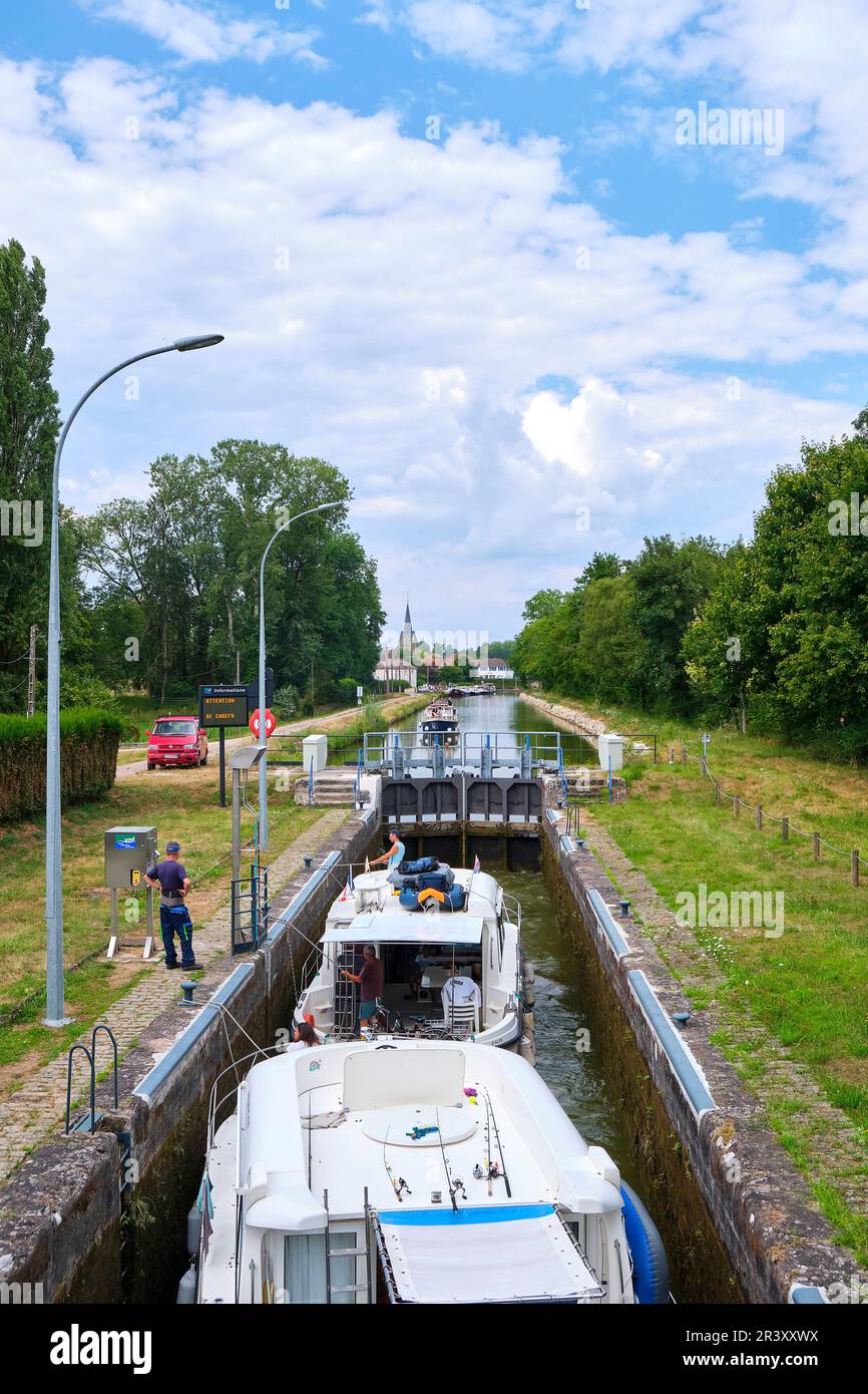 The Canal des Vosges in Corre (north-eastern France): small barges ...
