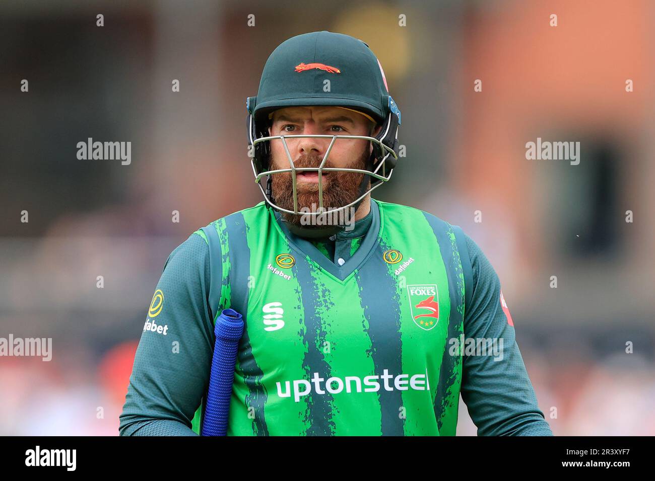 Arron Lilley of Leicestershire Foxes walks back to the pavilion after ...