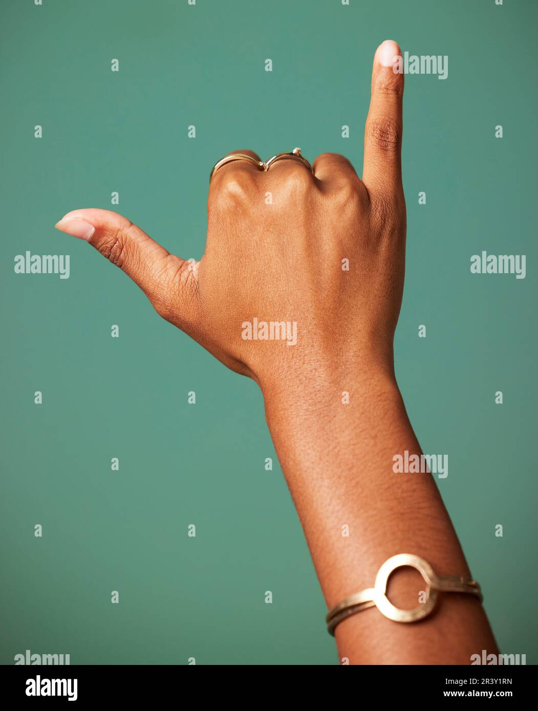 Woman, Shaka sign and hand in studio for surfer greeting, sign language ...