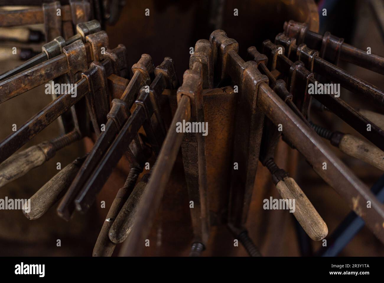 Bar clamps in the repair shop of a boatyard in Hamburg Stock Photo - Alamy