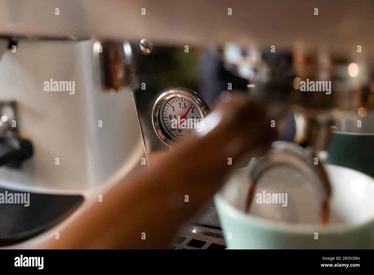 Coffee prep, the home Barista making Espresso using a Grinding Machine ...