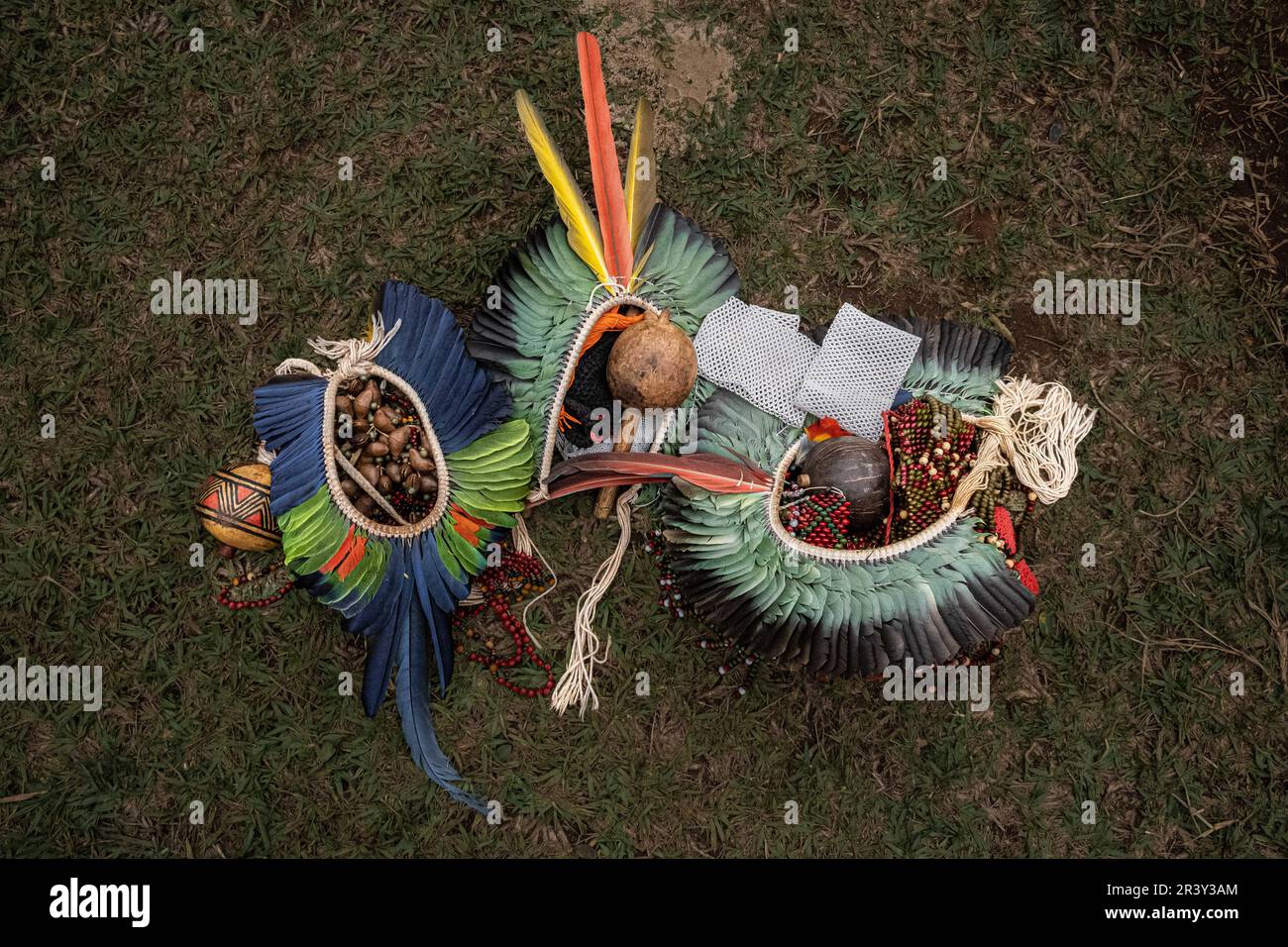 The head ornaments (cocar) and music instruments seen laying on the ...