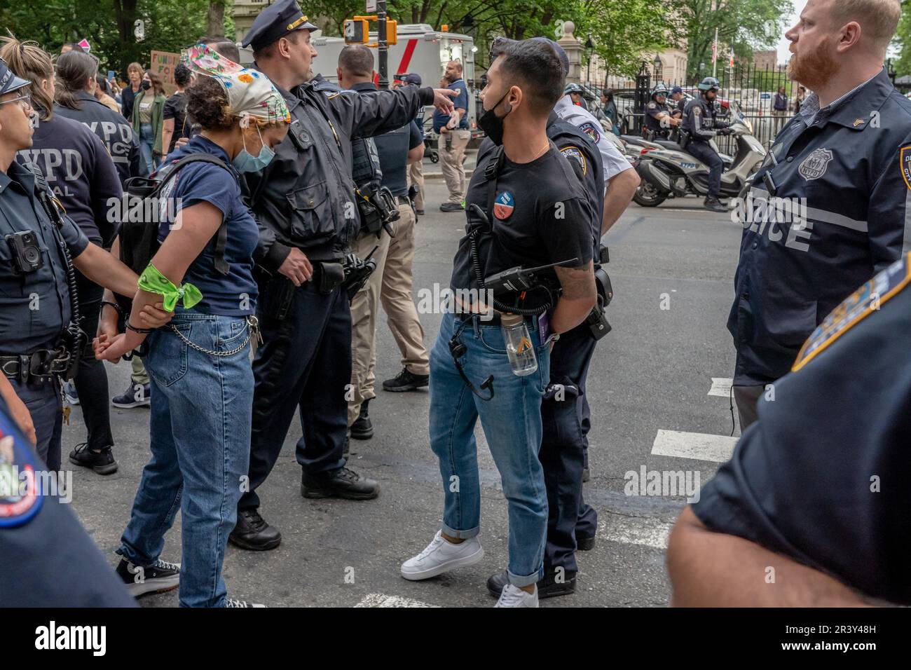 New York, United States. 24th May, 2023. Activists under arrest are led ...