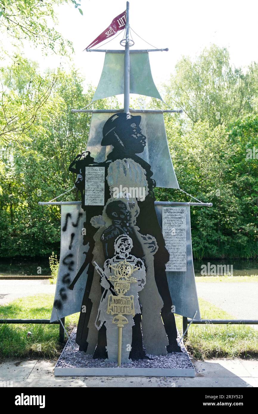 NOTE: LANGUAGE ON SCULPTURE Racial slur graffiti on Luke Perry's ...