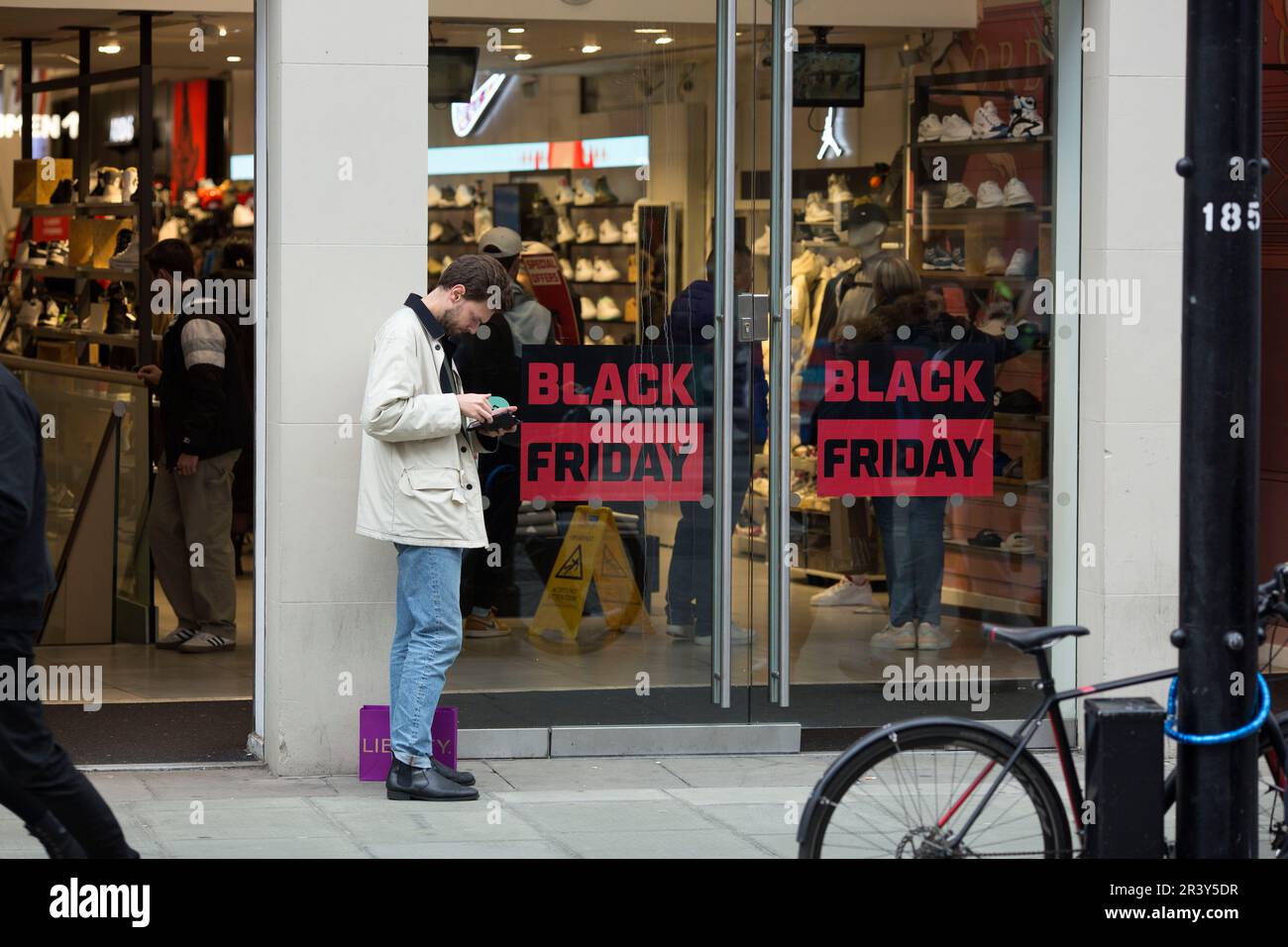 Black Friday logos are seen displayed outside a store in London ahead ...