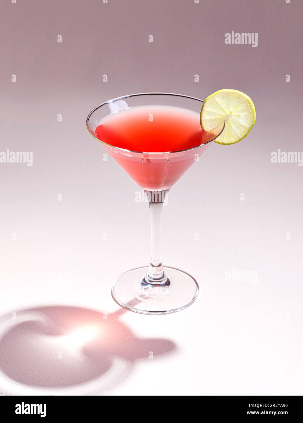 Cold alcoholic or non-alcoholic cocktail on pastel background. Hard ...