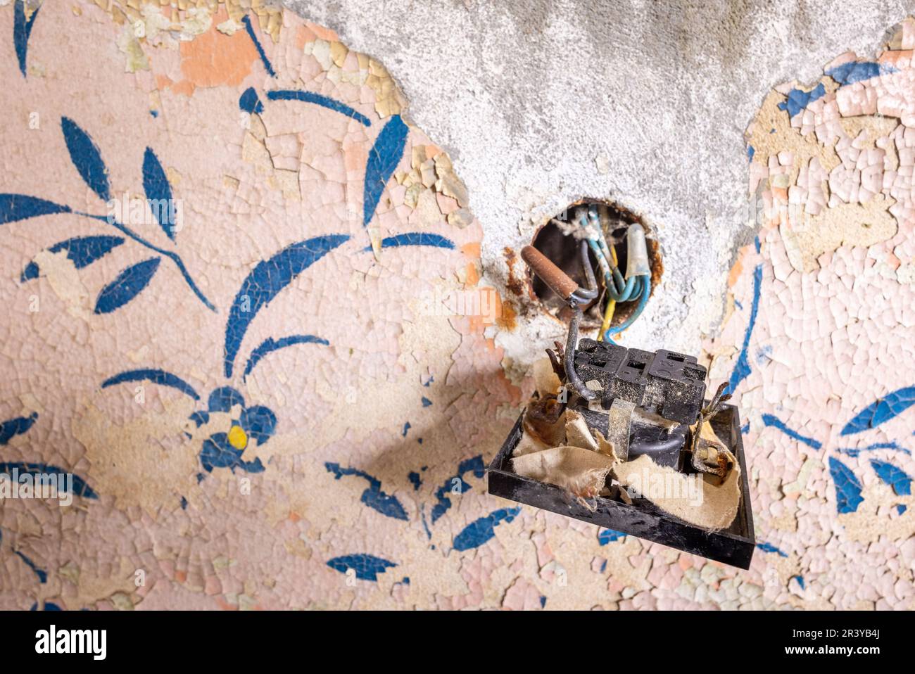 Old flush-mounted box and switch box electrical system Stock Photo - Alamy