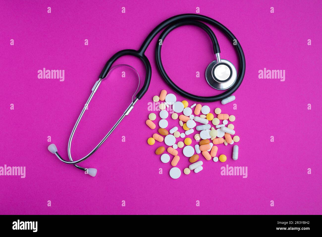 Concept medical of exam, diagnosis and treatment, stethoscope on pink ...