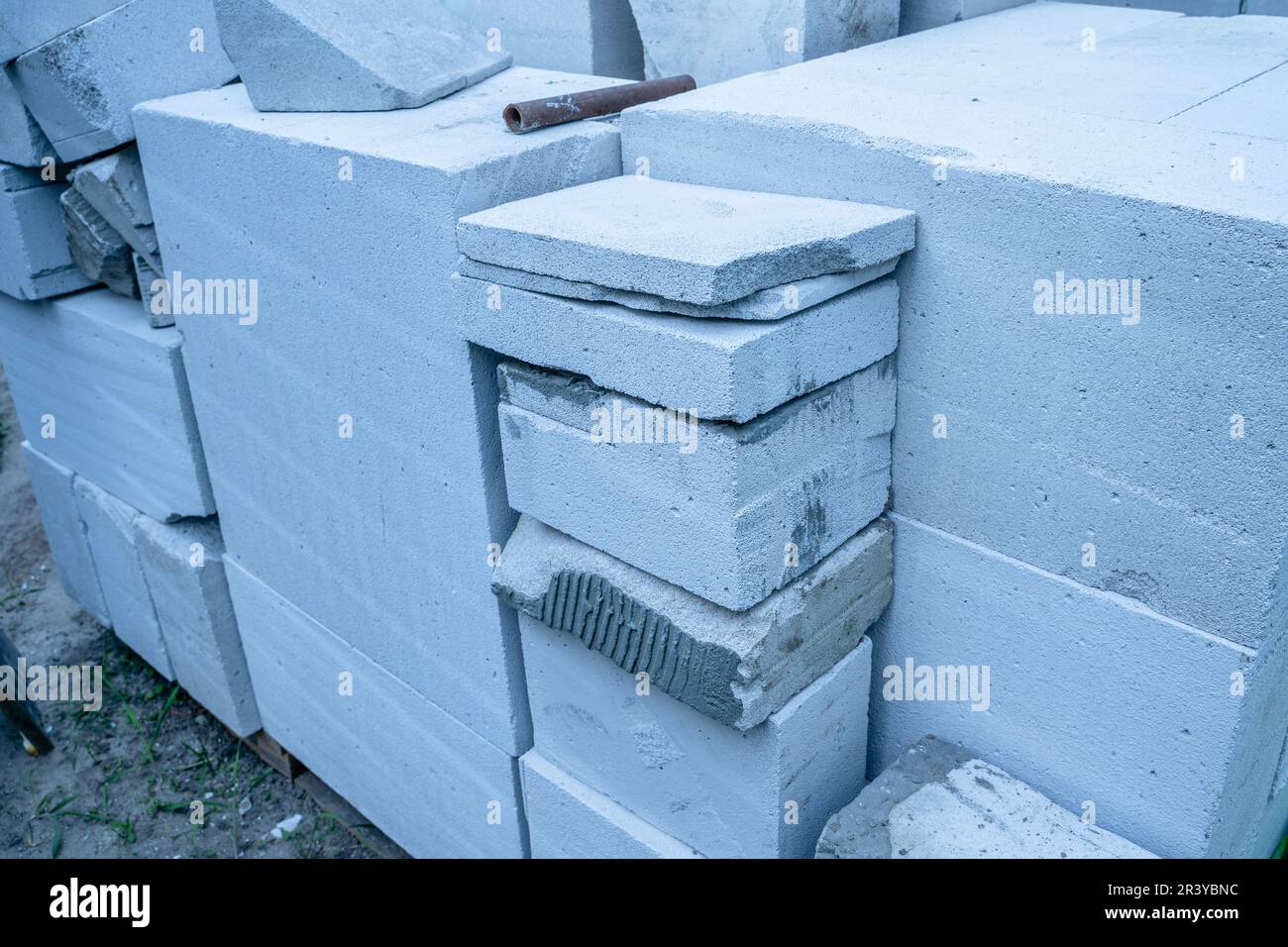 Scraps and pieces of aerated concrete blocks, close-up. Residues and ...