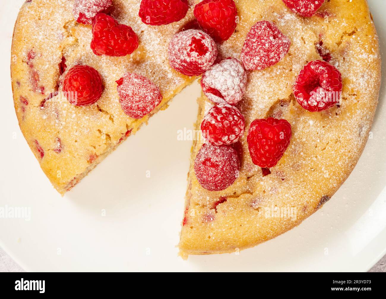 raspberry cake segment removed Stock Photo - Alamy