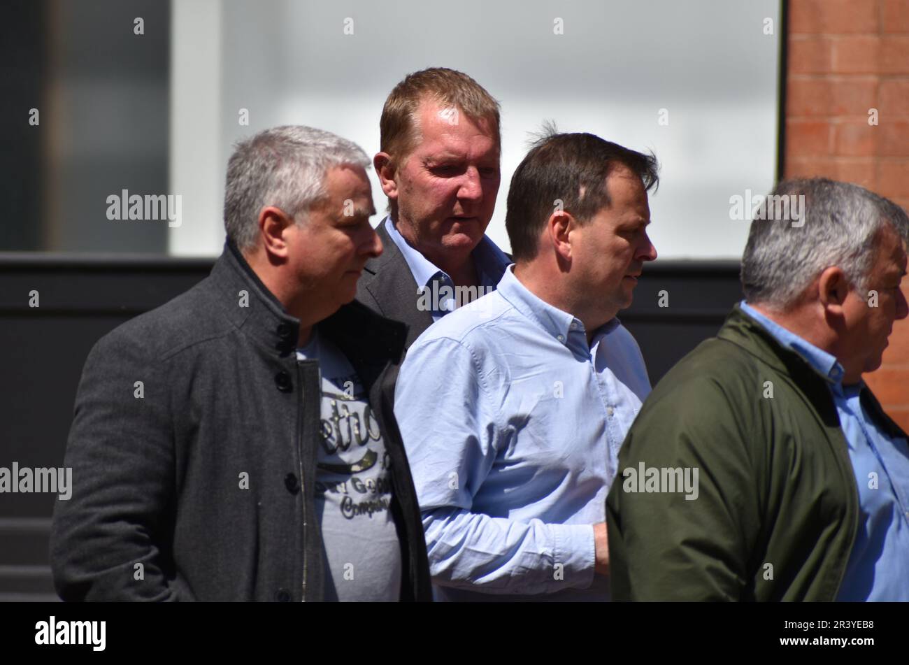 Train driver Ian Pickering (second left) arriving at Birmingham Crown ...
