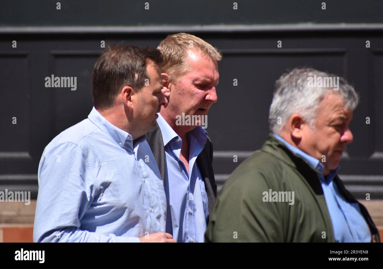 Train driver Ian Pickering (centre) arriving at Birmingham Crown Court ...