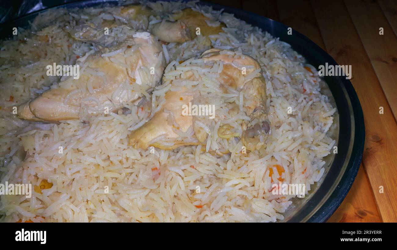 Madghout is a dish consisting of rice, chicken or meat, cooked using ...