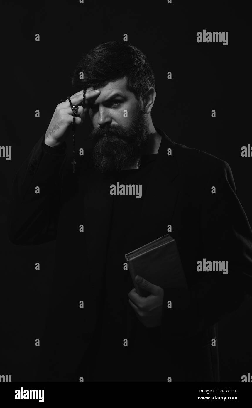 Pastor or preacher with the Bible. Praying hands priest portrait of ...