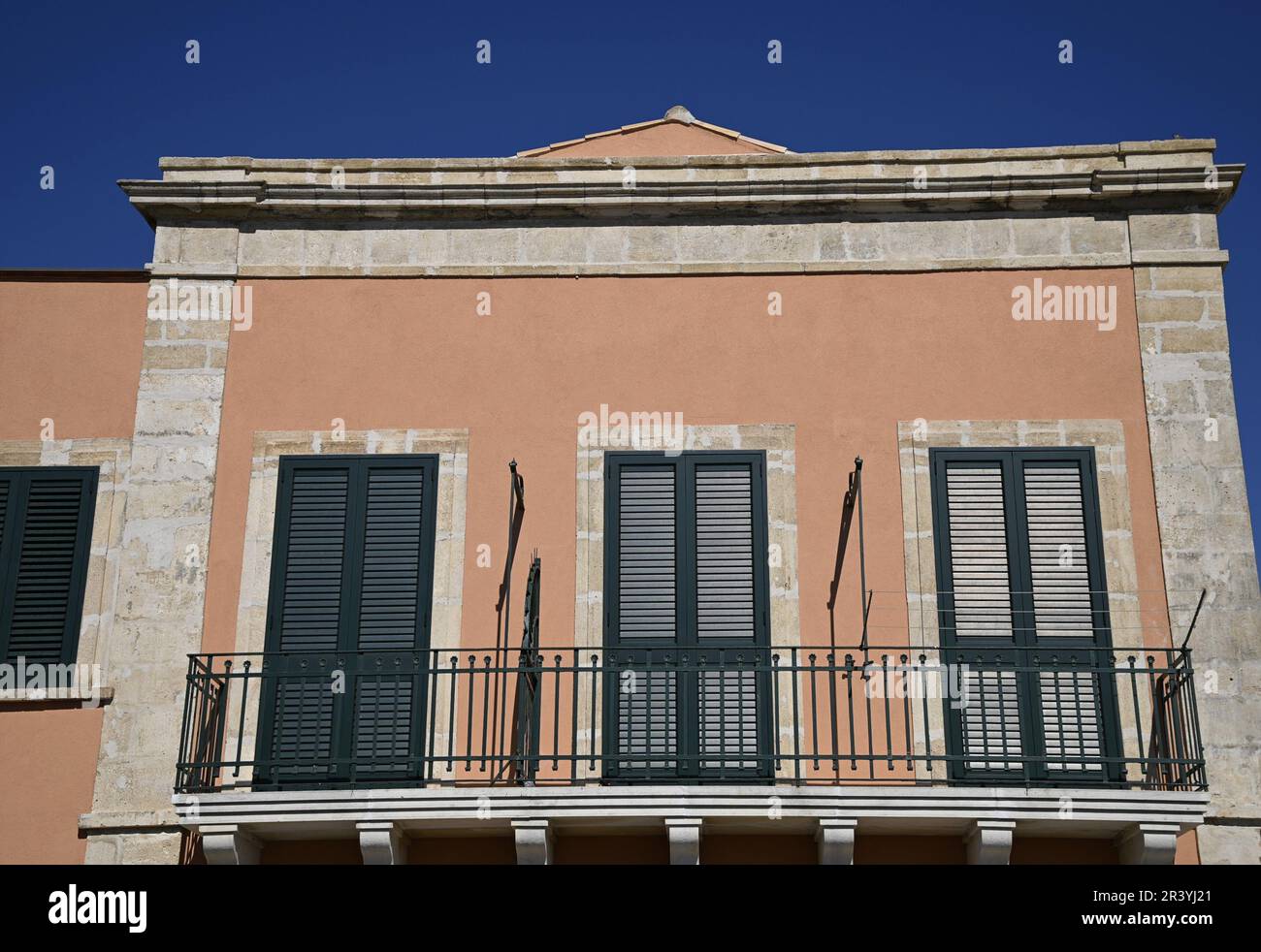 Old Neoclassical house facade in Marzamemi Sicily, Italy Stock Photo ...