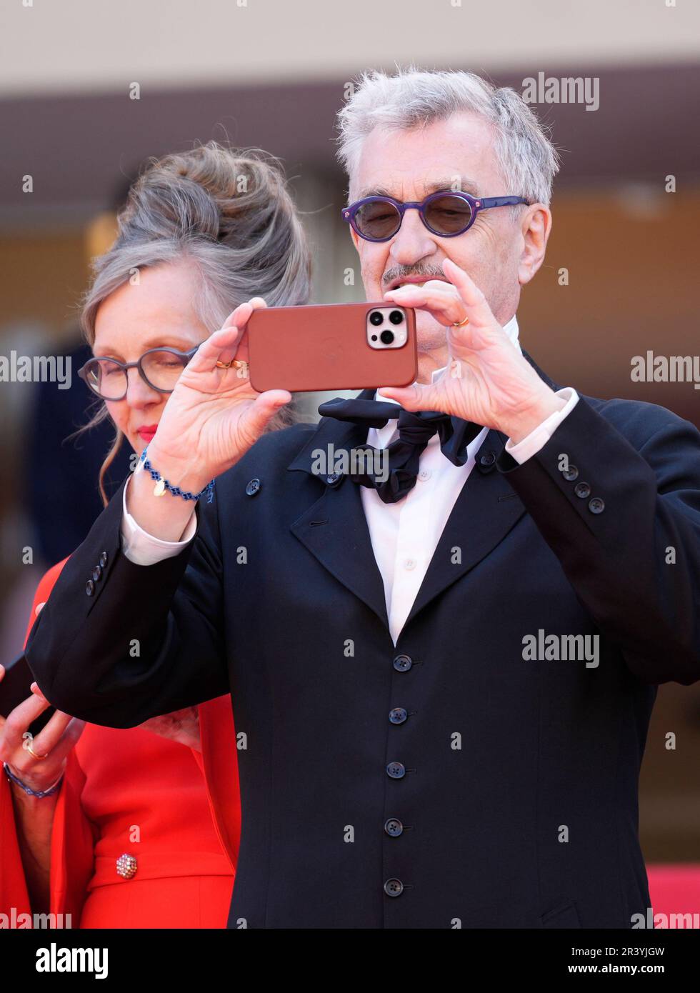 Donata Wenders, left, and Wim Wenders pose for photographers upon ...