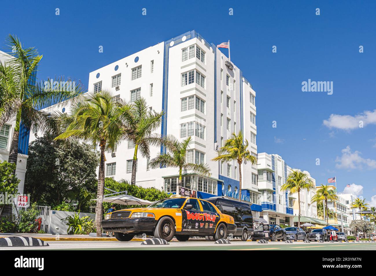 Miami, USA - December 7, 2022. Yellow taxi crossing in front of the ...