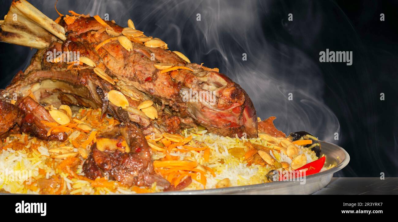 Mandi is a traditional dish from Yemen of meat, rice, and spices. It is ...