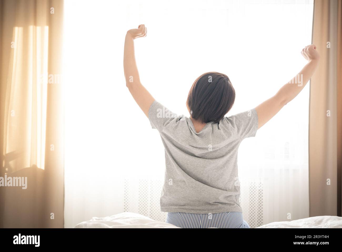 Morning stretch in bed hi-res stock photography and images - Alamy