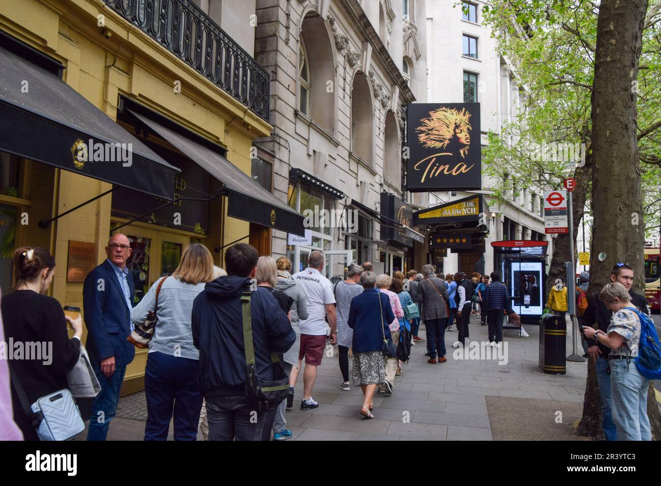 London, England, UK. 25th May, 2023. People queue outside Aldwych ...